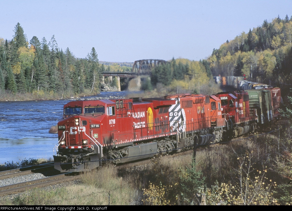 CP 9716 6060 5994 is w/b with #221 at Sistons Corners, ON